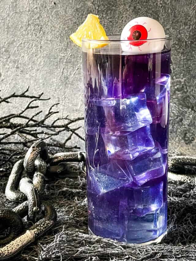 Purple People Eater Halloween Cocktail (+Mocktail) - Three Olives Branch