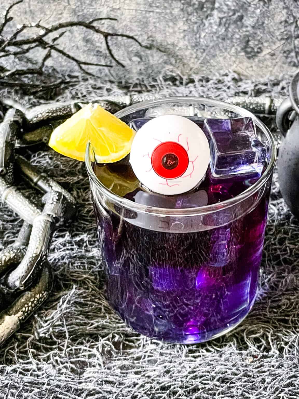 Purple People Eater Halloween Cocktail (+Mocktail) - Three Olives Branch