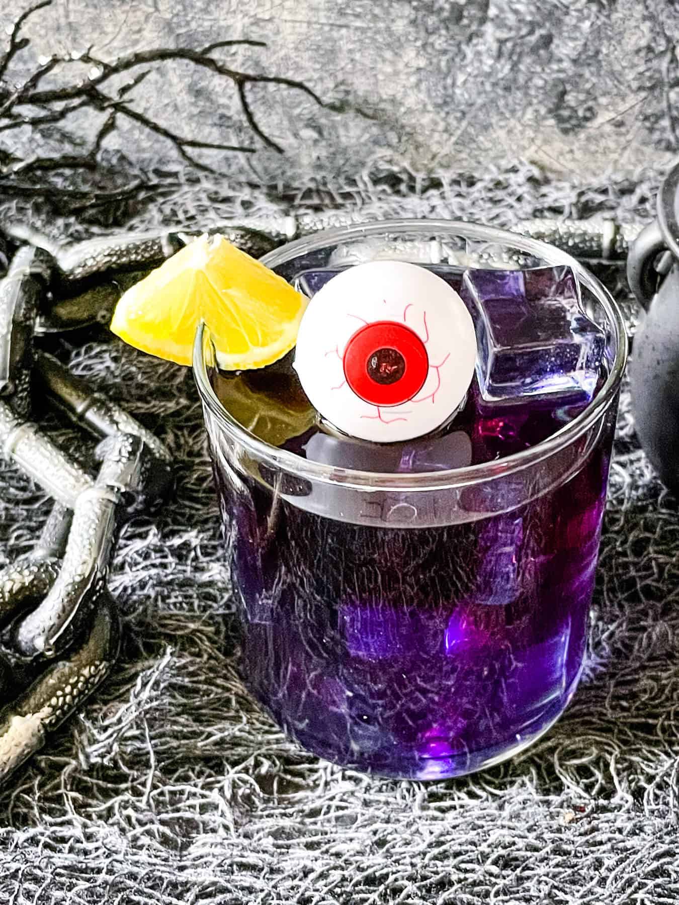 Purple People Eater Halloween Cocktail (+Mocktail) - Three Olives Branch